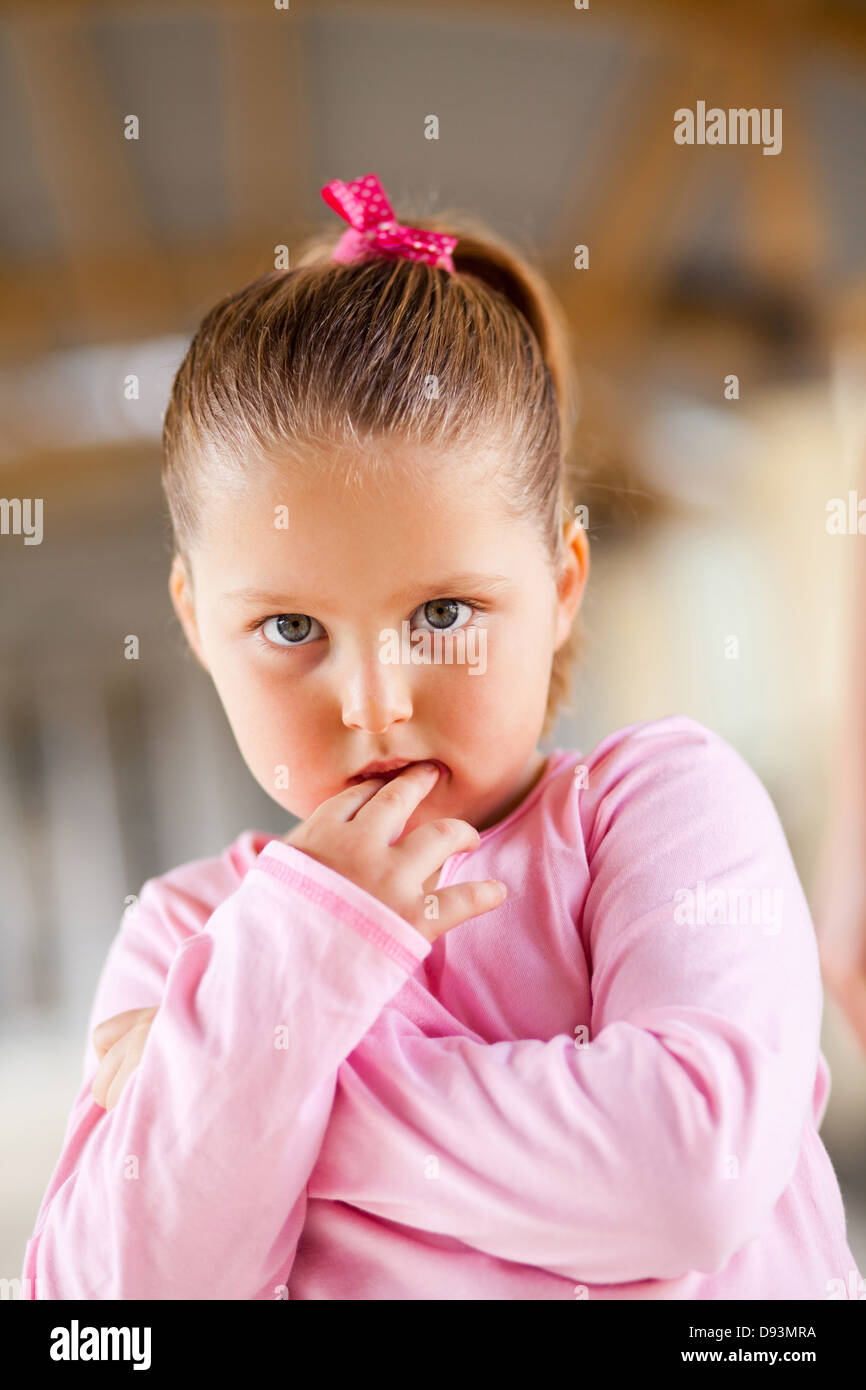 cute little girl looks scared Stock Photo - Alamy