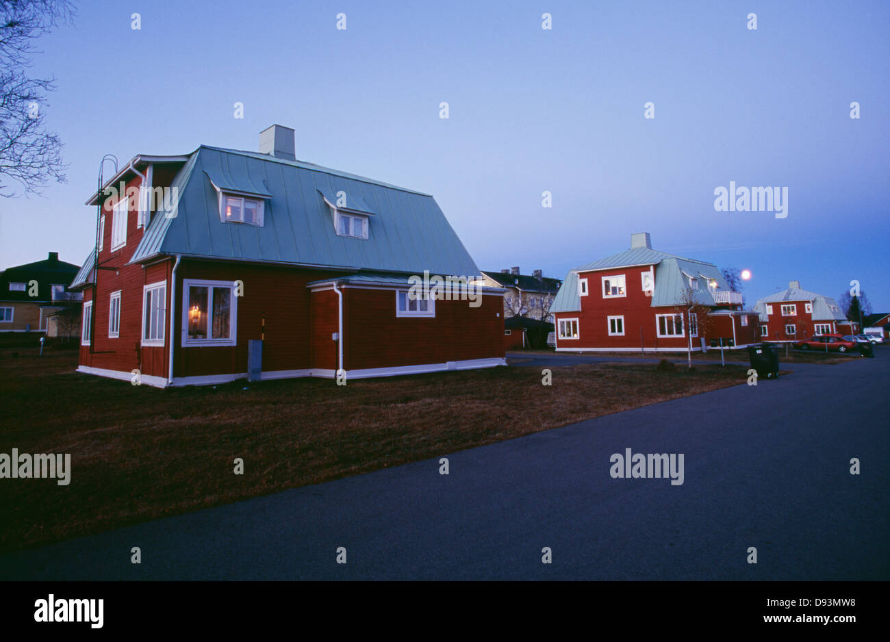 Houses by road, side view Stock Photo - Alamy