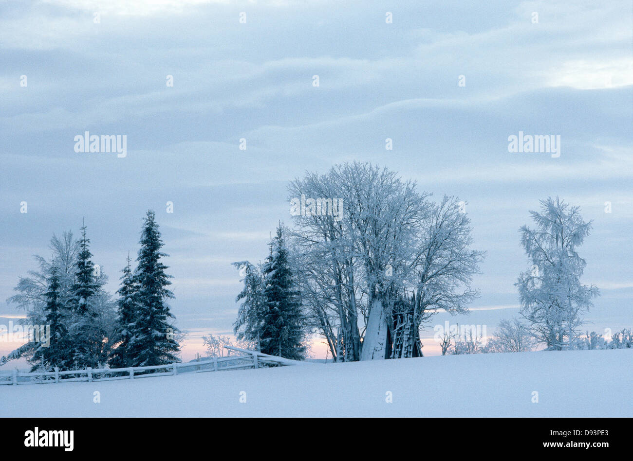 Cloudy sky over winter landscape Stock Photo - Alamy