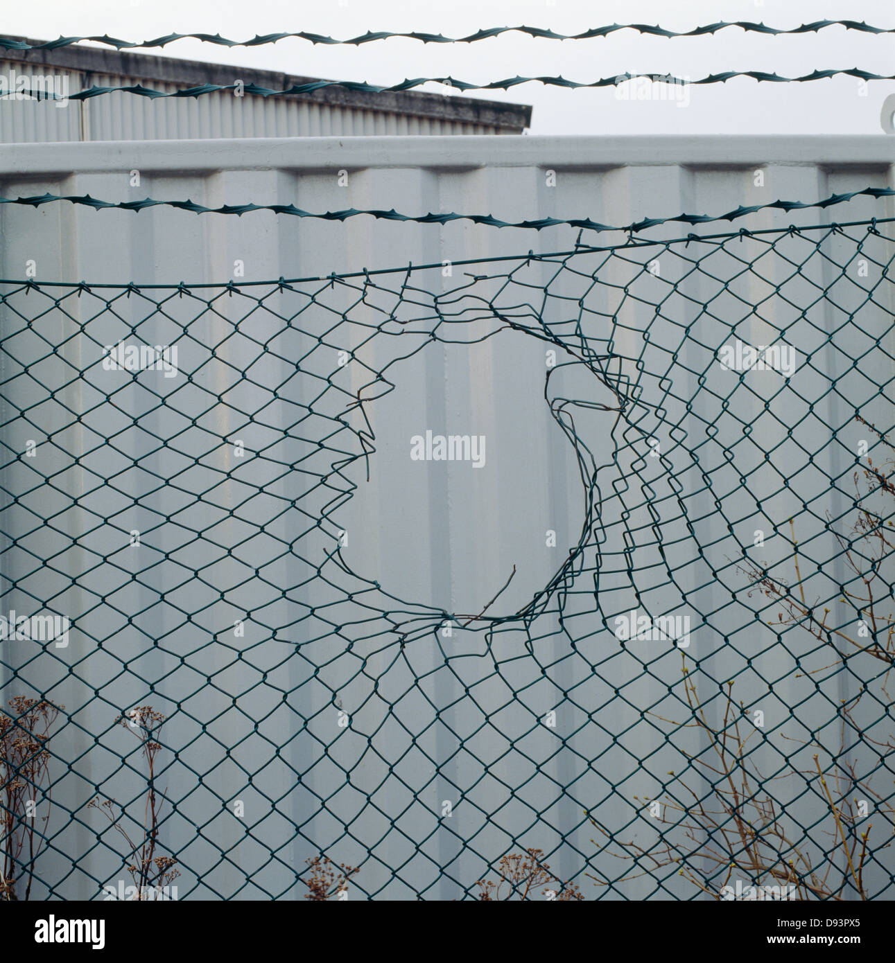 Damaged fence, close-up Stock Photo - Alamy