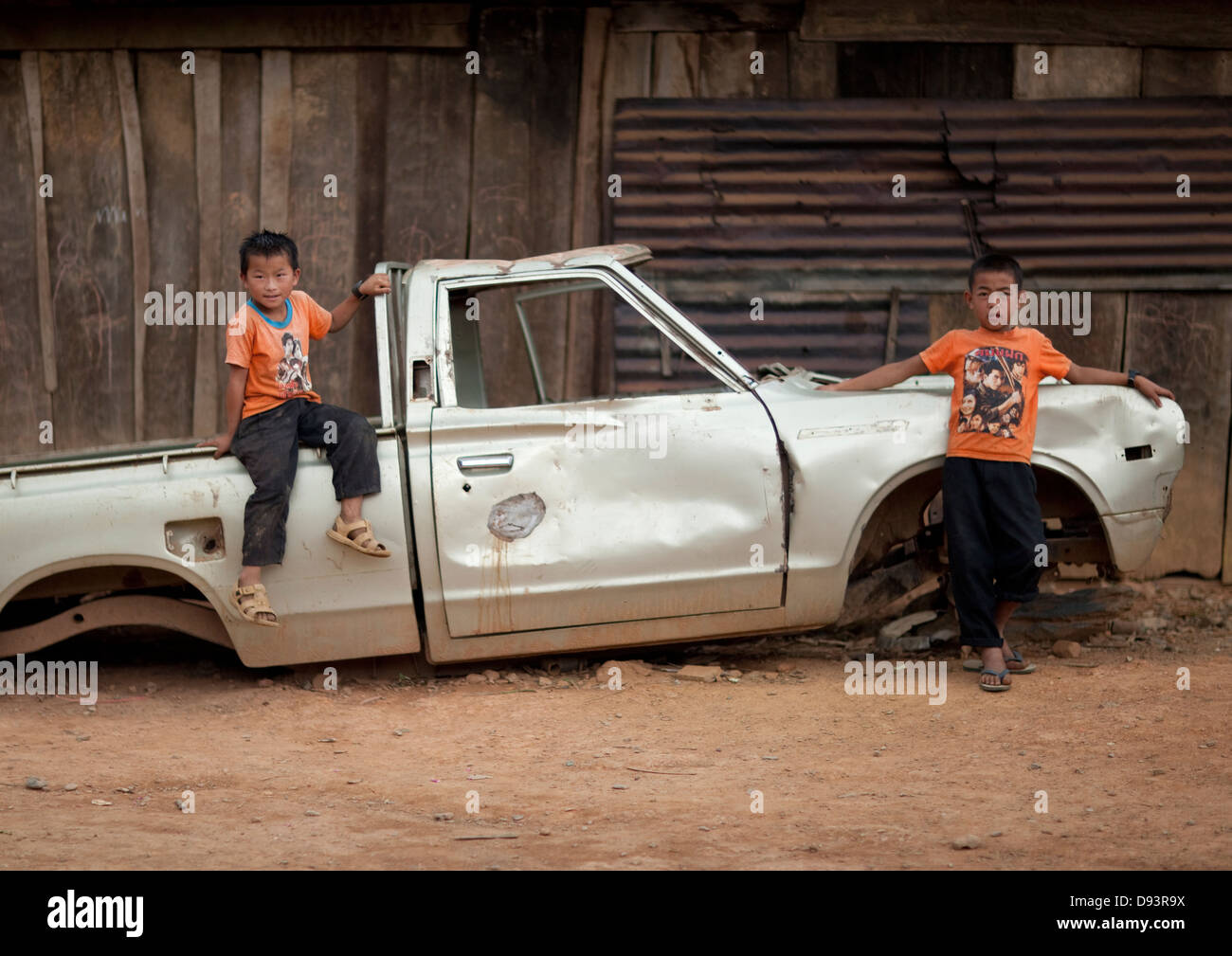 Hmong Minority Kids Sitting On An Ld Car, Luang Prabang, Laos Stock ...