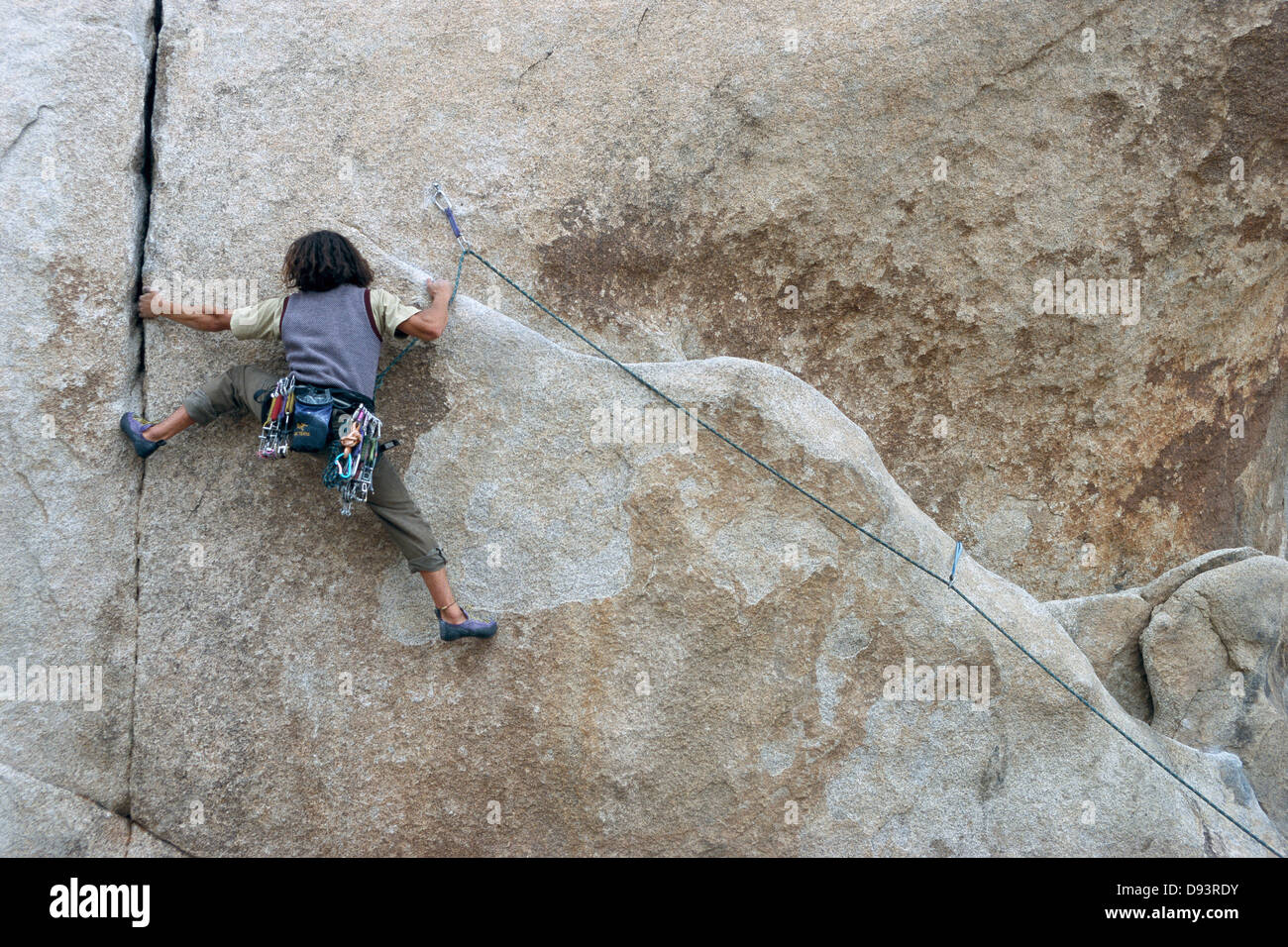 Climbing on a cliff face Stock Photo - Alamy