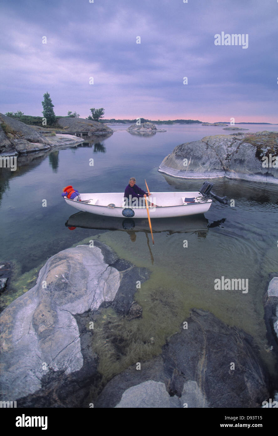 People boating on lake Stock Photo - Alamy