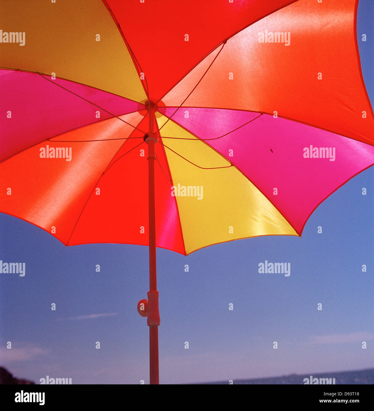 Multi color beach umbrella hi-res stock photography and images - Alamy