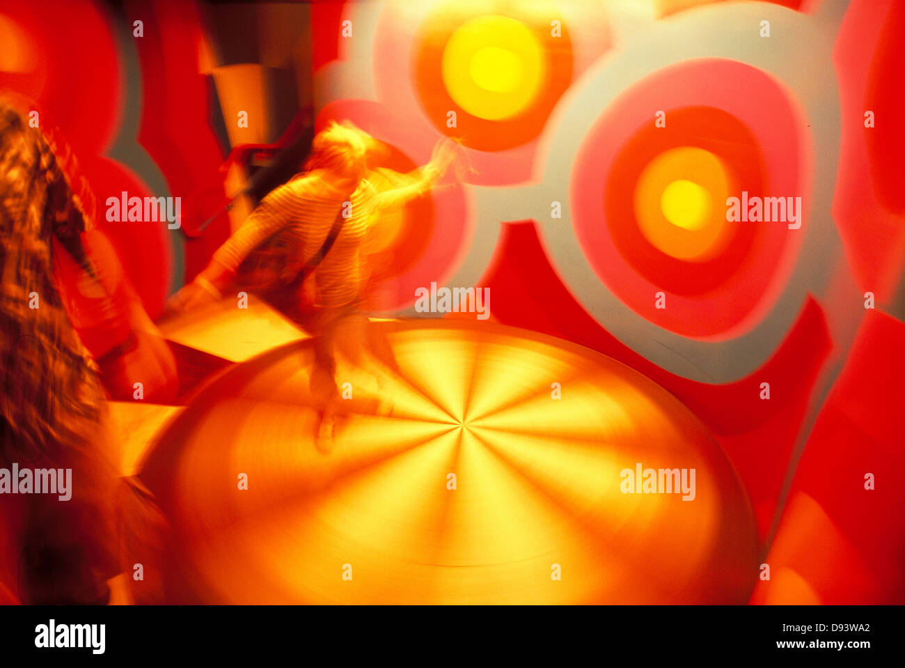 Man spinning around in an amusement parc Stock Photo - Alamy