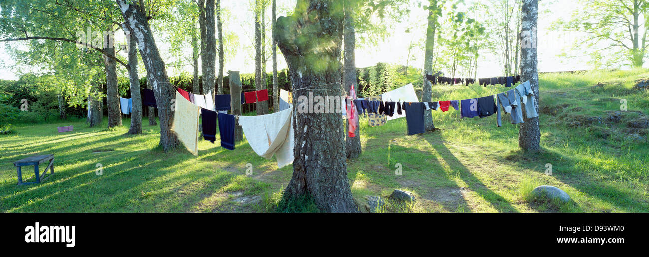 Clothes on a clothesline Stock Photo - Alamy