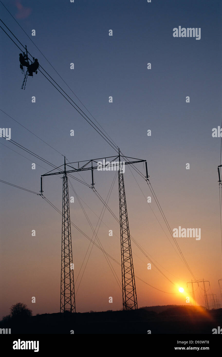 Power line work silhouette hi-res stock photography and images - Alamy