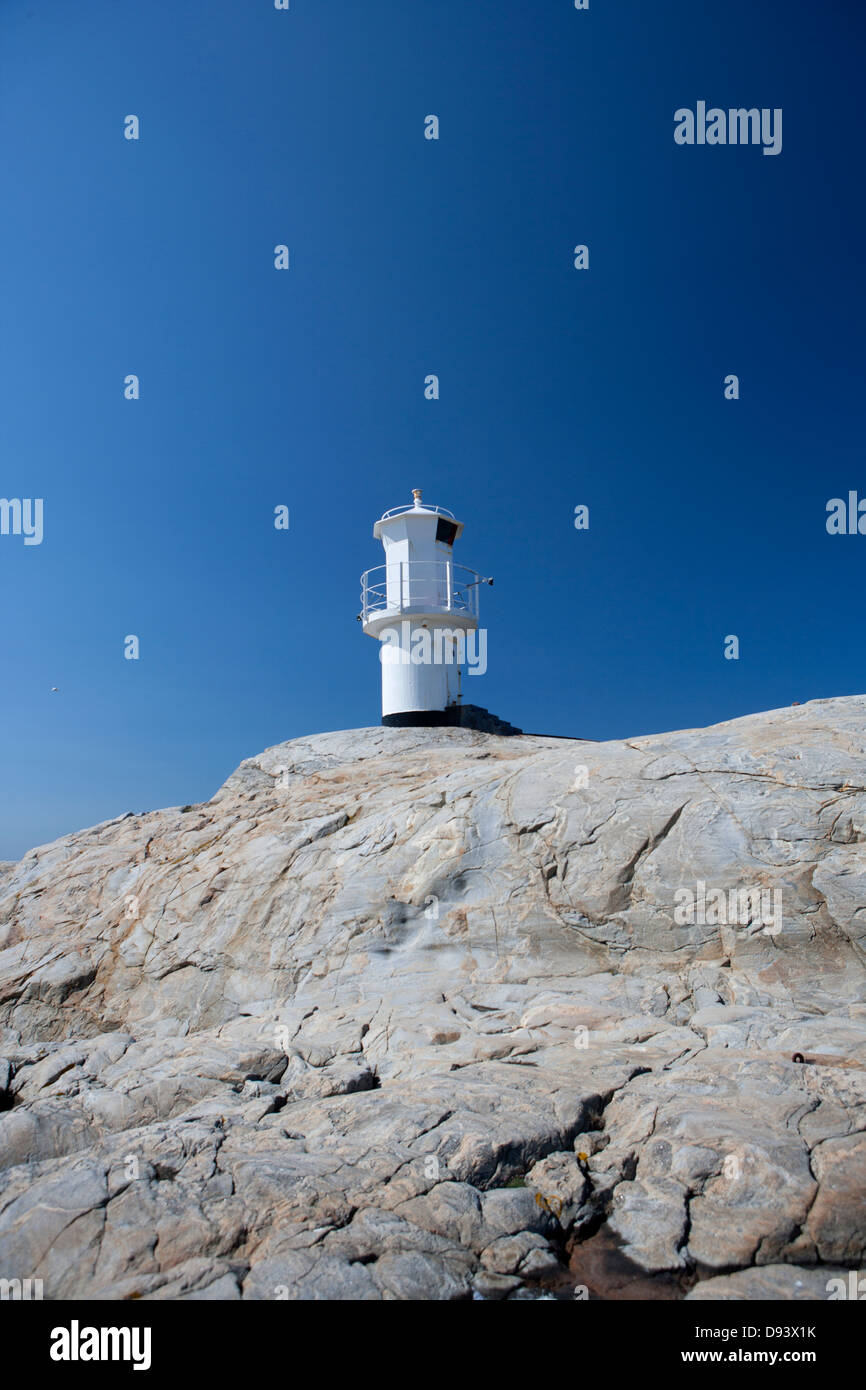 View of lighthouse on cliff Stock Photo - Alamy