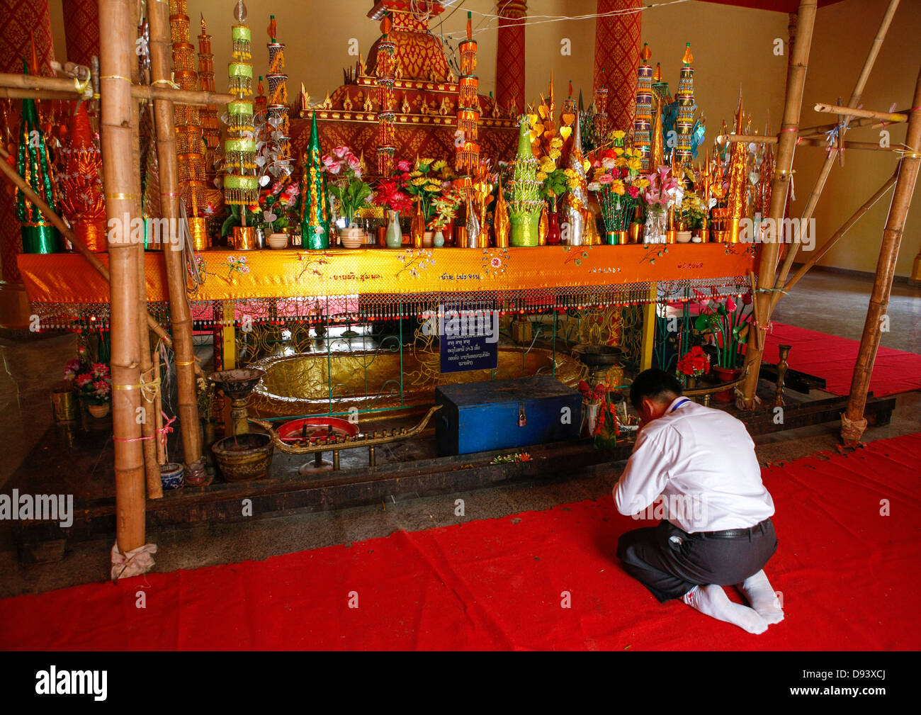 Praying in a temple hi-res stock photography and images - Alamy