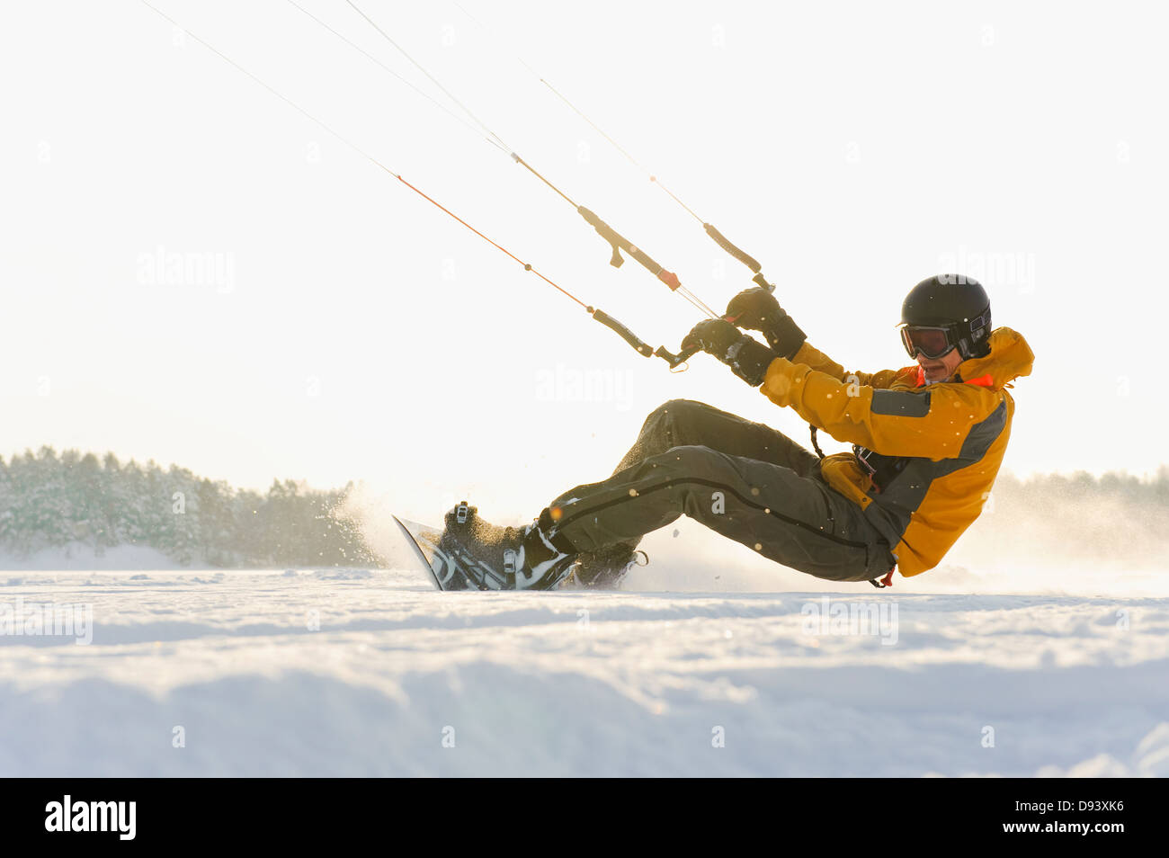 Man kiteboarding in snow Stock Photo - Alamy