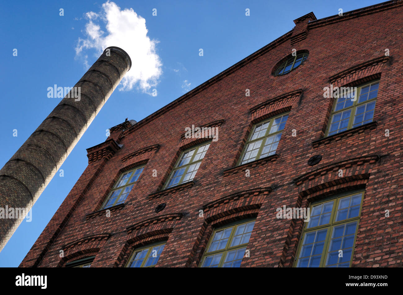 Factory building with smoke emitting from chimney, low angle view Stock ...