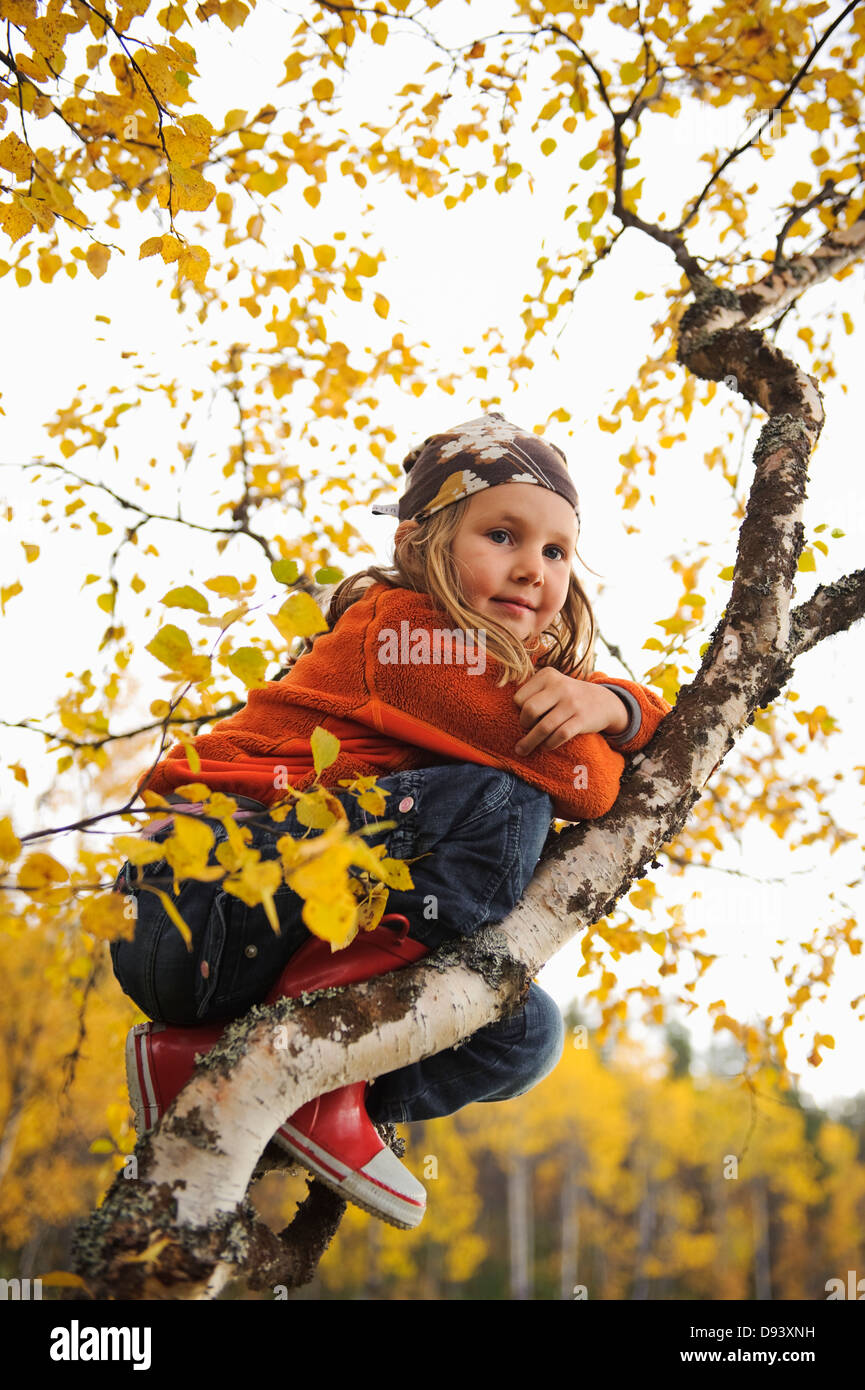 Girls sitting on branch hi-res stock photography and images - Alamy