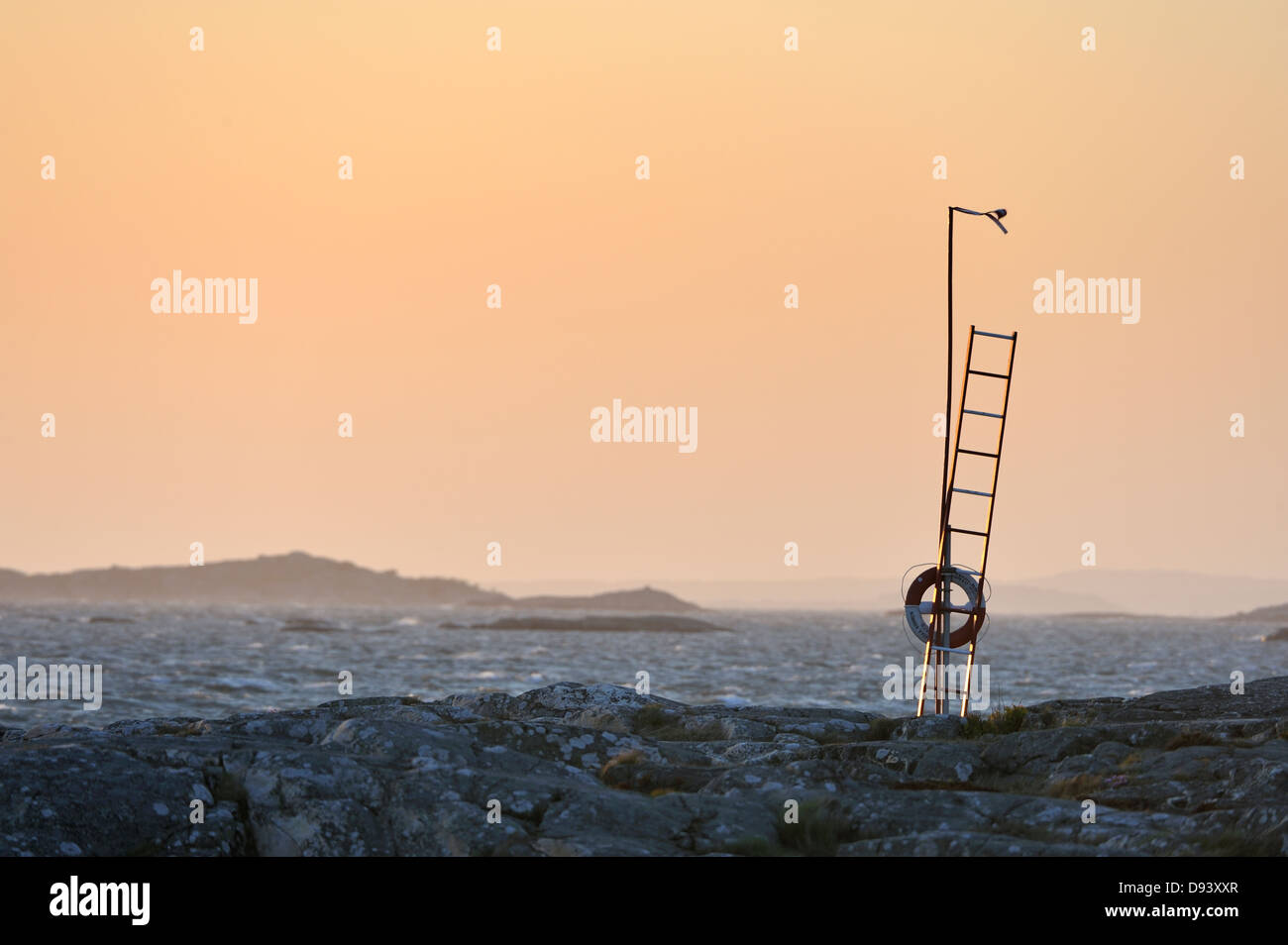 Lifebelt and ladder at coastline Stock Photo - Alamy