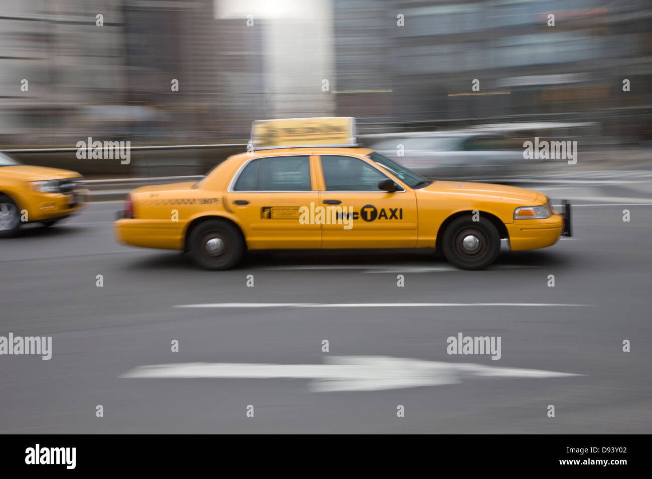 Yellow taxis on city street, blurred motion Stock Photo - Alamy