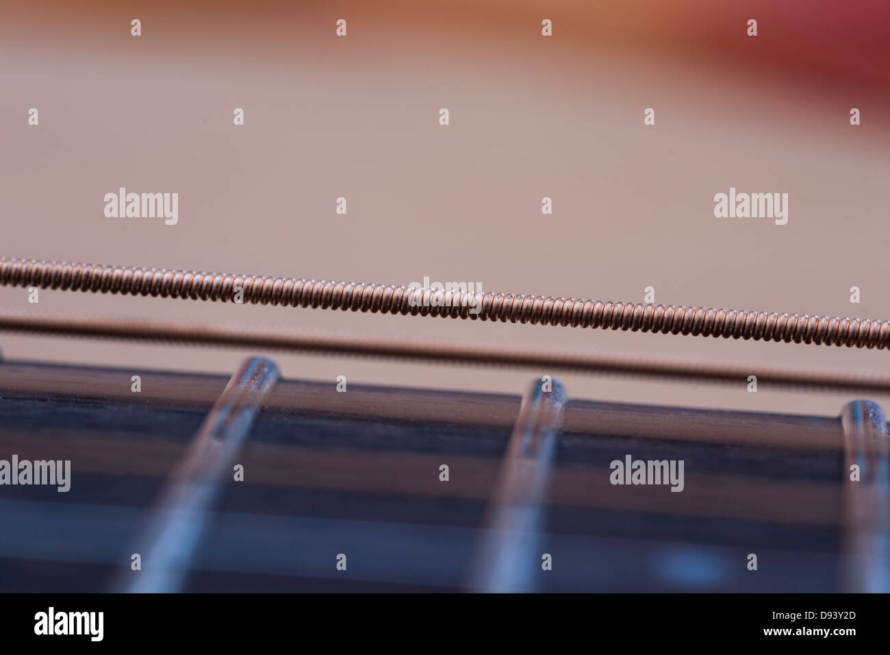 side view of a fret board with strings Stock Photo - Alamy
