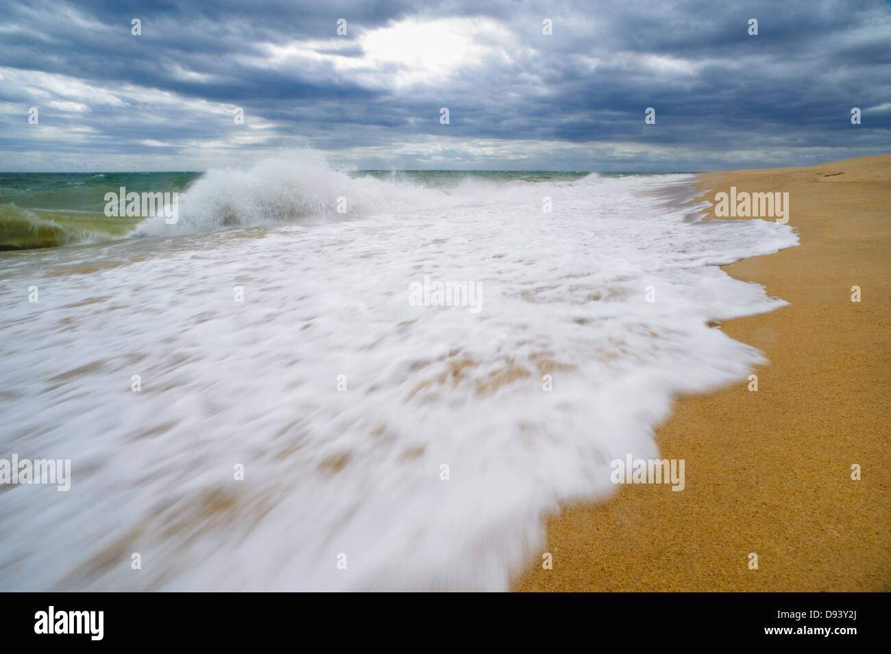 Sea waves splashing on shore Stock Photo - Alamy