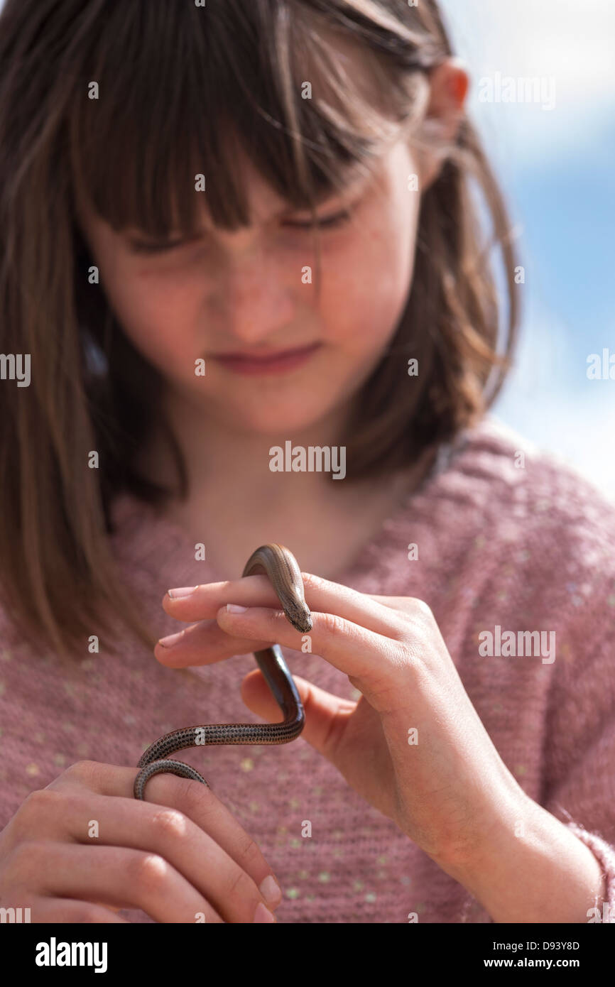 Child holding snake hi-res stock photography and images - Alamy