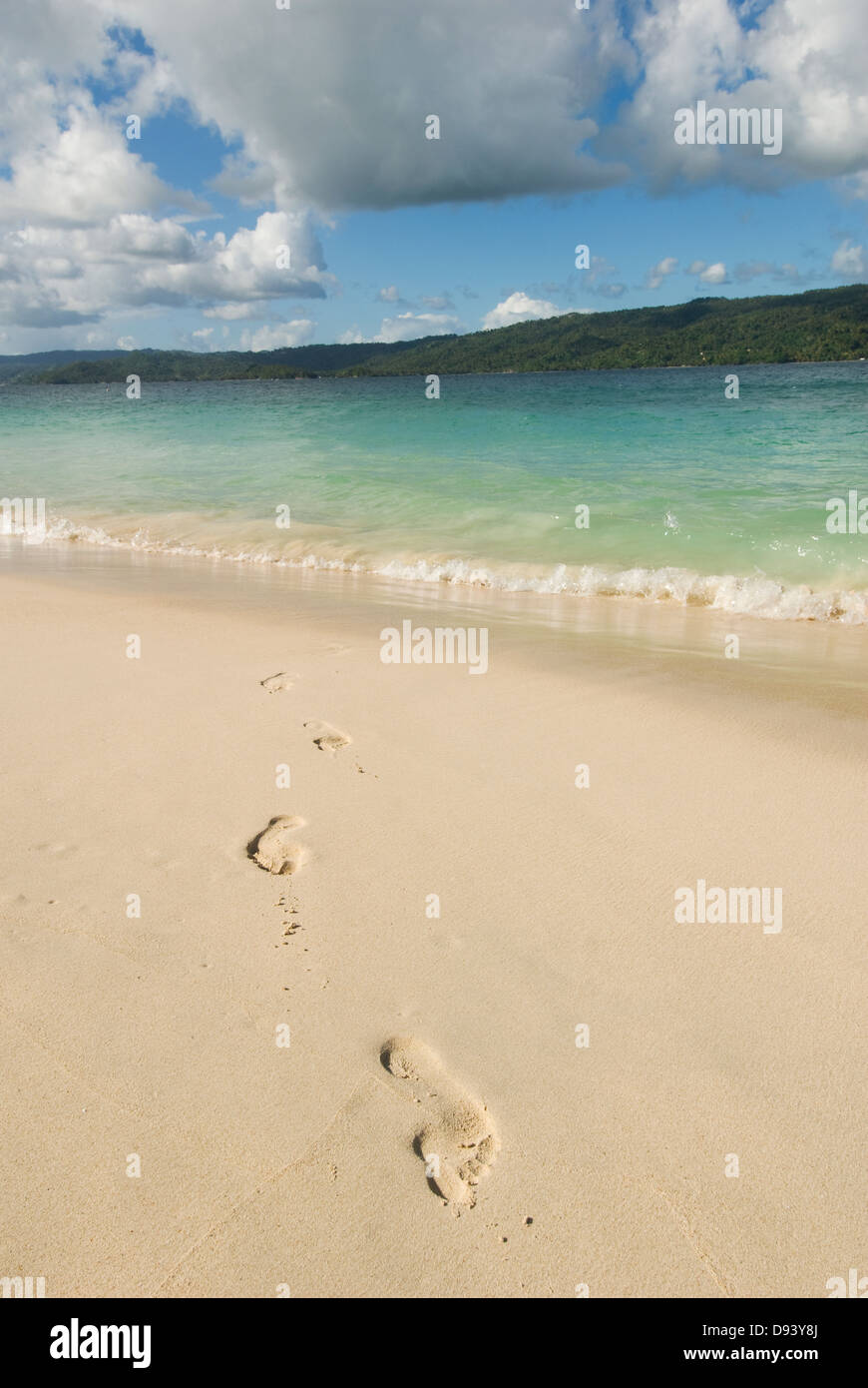 Footprints on sand at beach Stock Photo - Alamy