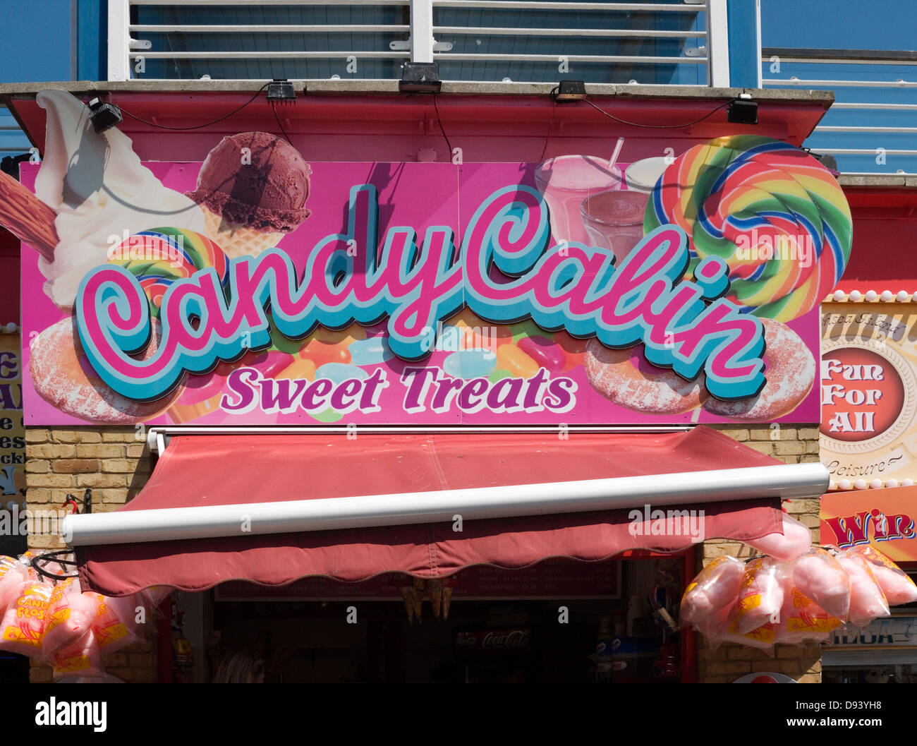 colourful seaside shop sign advertising sweets and ice cream Stock ...