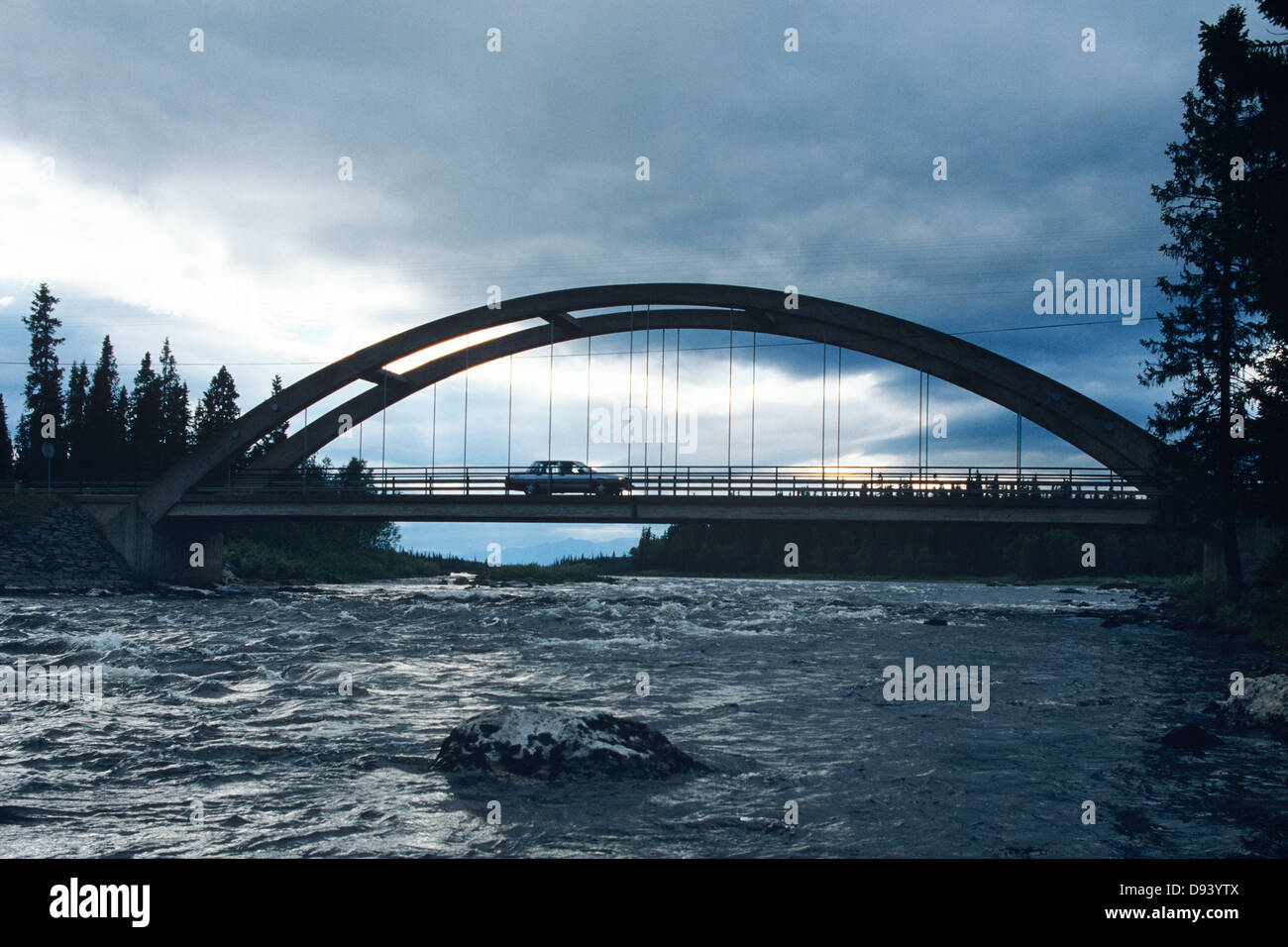 Car travelling on bridge Stock Photo - Alamy