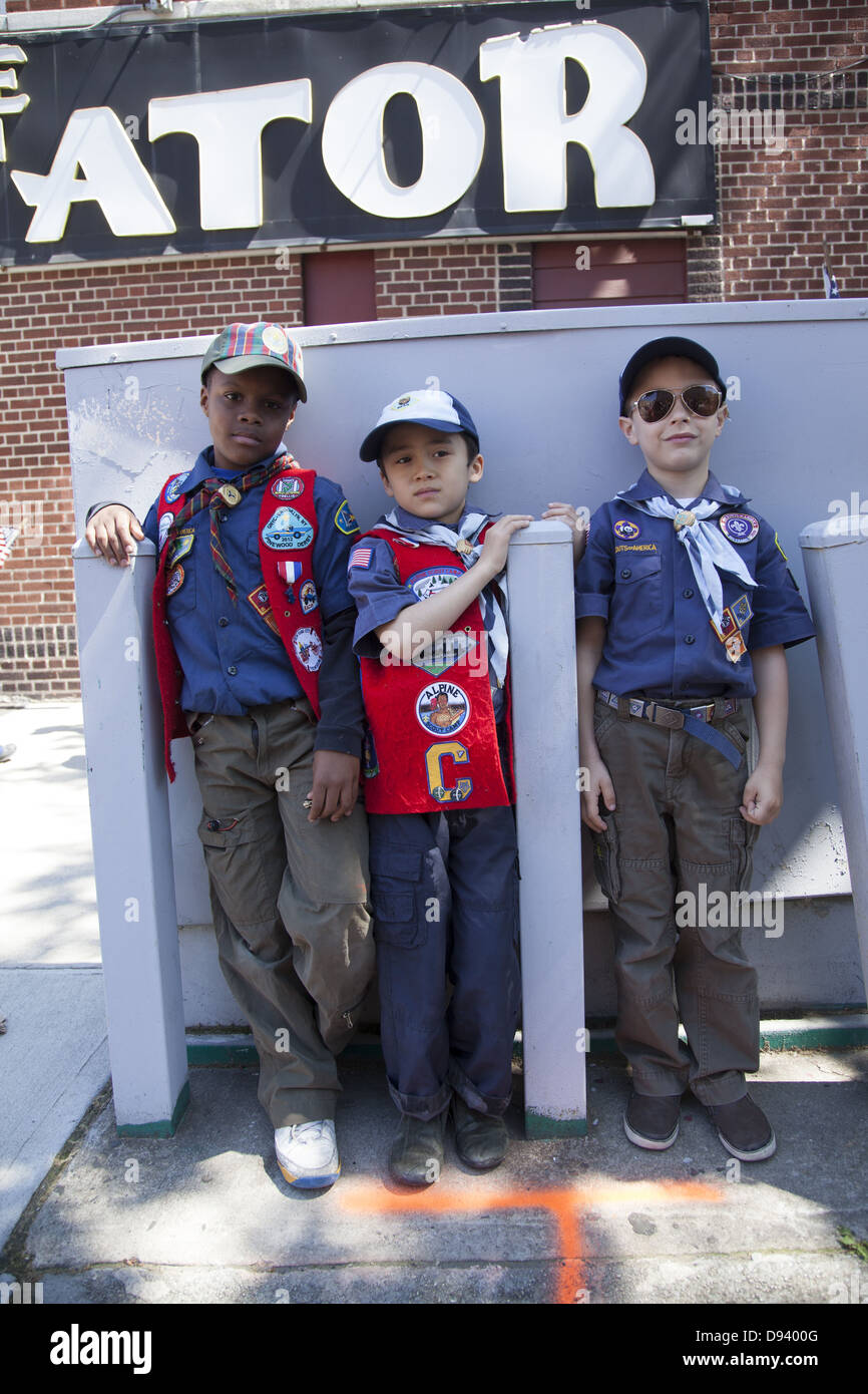 Three friends and Cub Scouts ready to march at the Memorial Day Parade ...