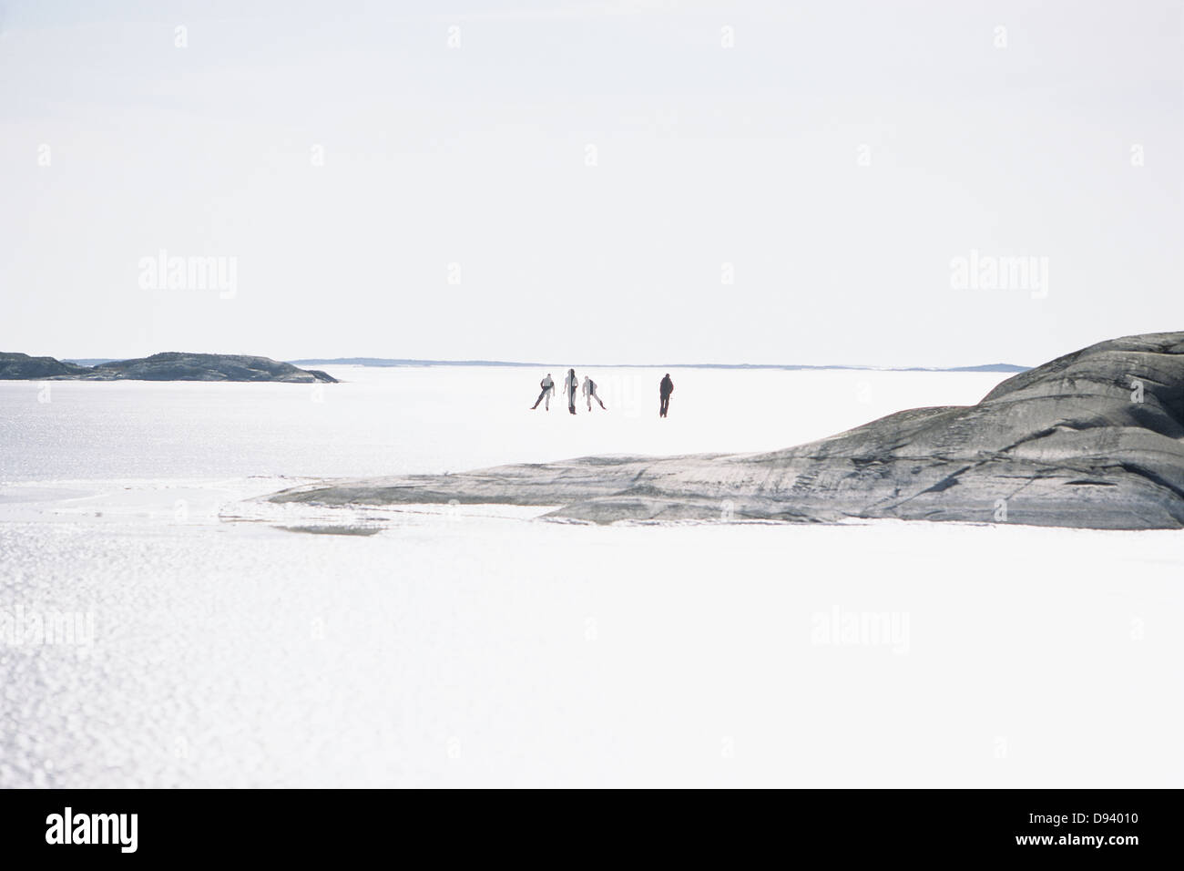 Four people long-distance skating, Aland, Fiinland Stock Photo - Alamy