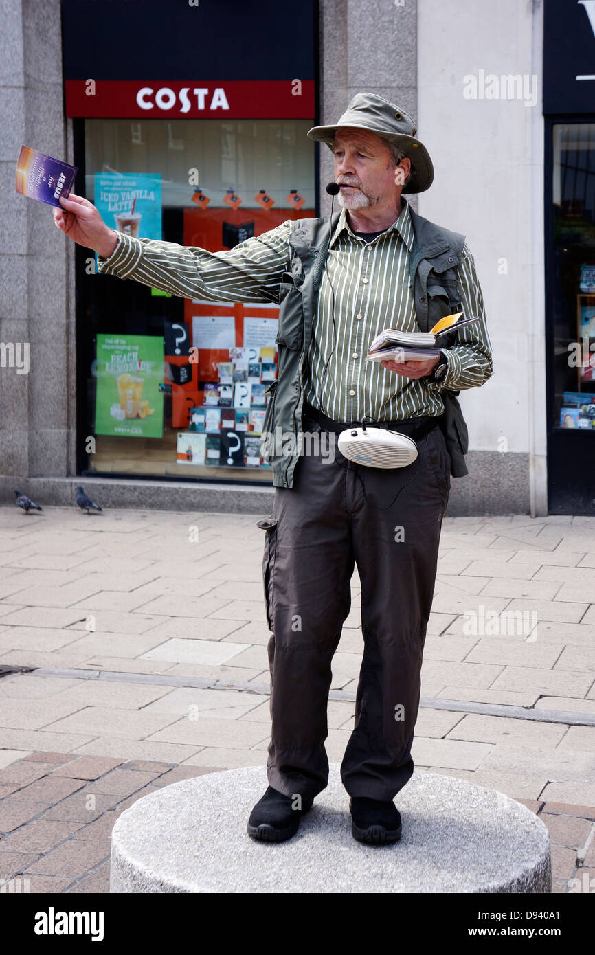 religious man publicly preaching in city center Stock Photo - Alamy