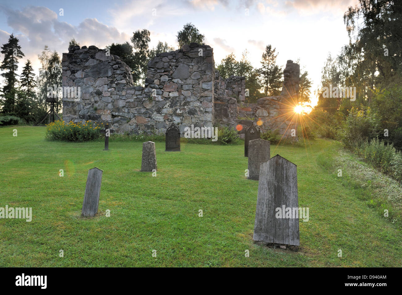 Ruins of church and graveyard at dusk Stock Photo - Alamy