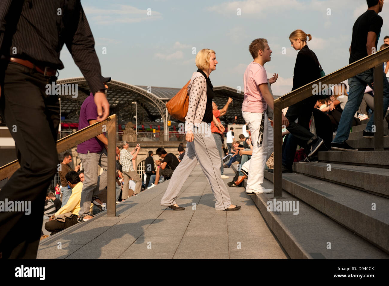Rail Commuters walking up steps Stock Photo - Alamy