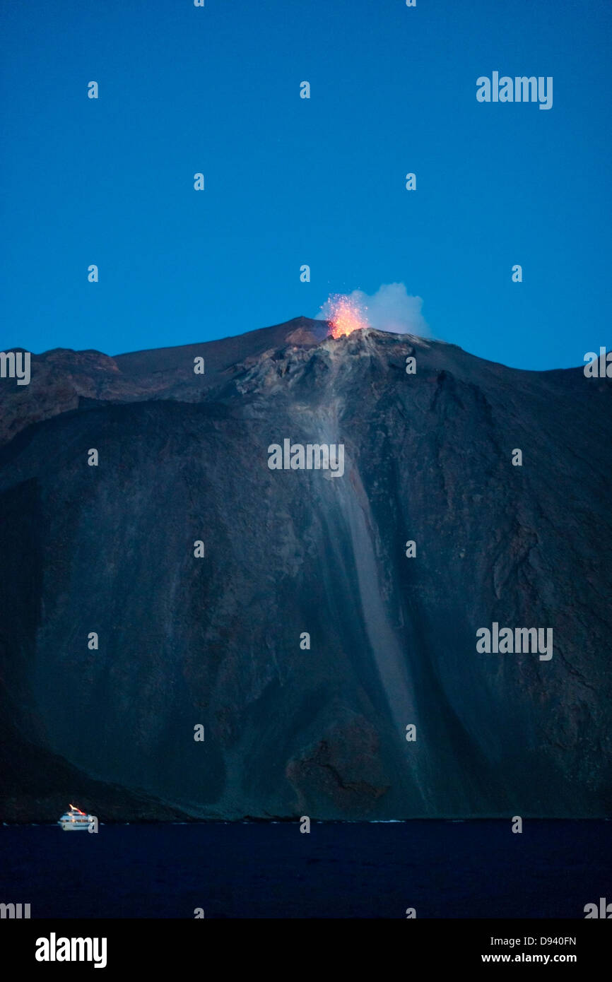 Erupting volcano at coast Stock Photo - Alamy