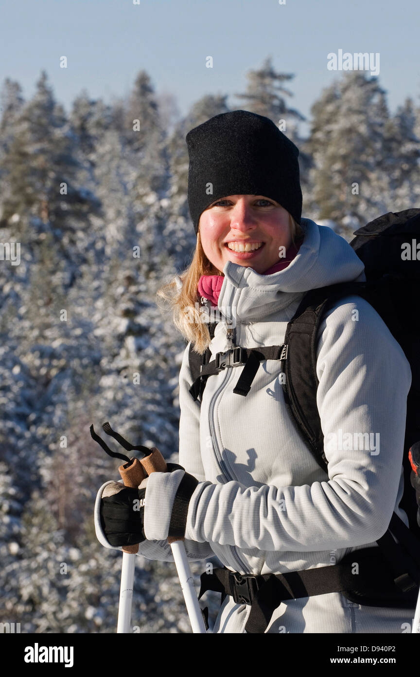 Portrait of female skier smiling Stock Photo - Alamy