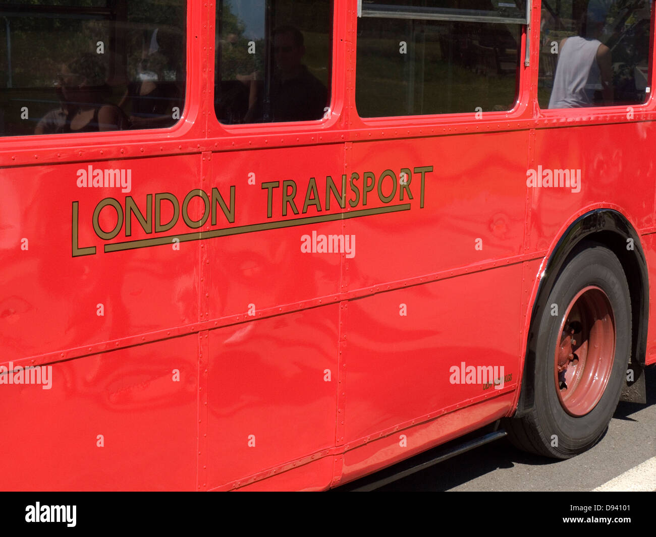 old london transport logo stands out against the bright red paintwork ...