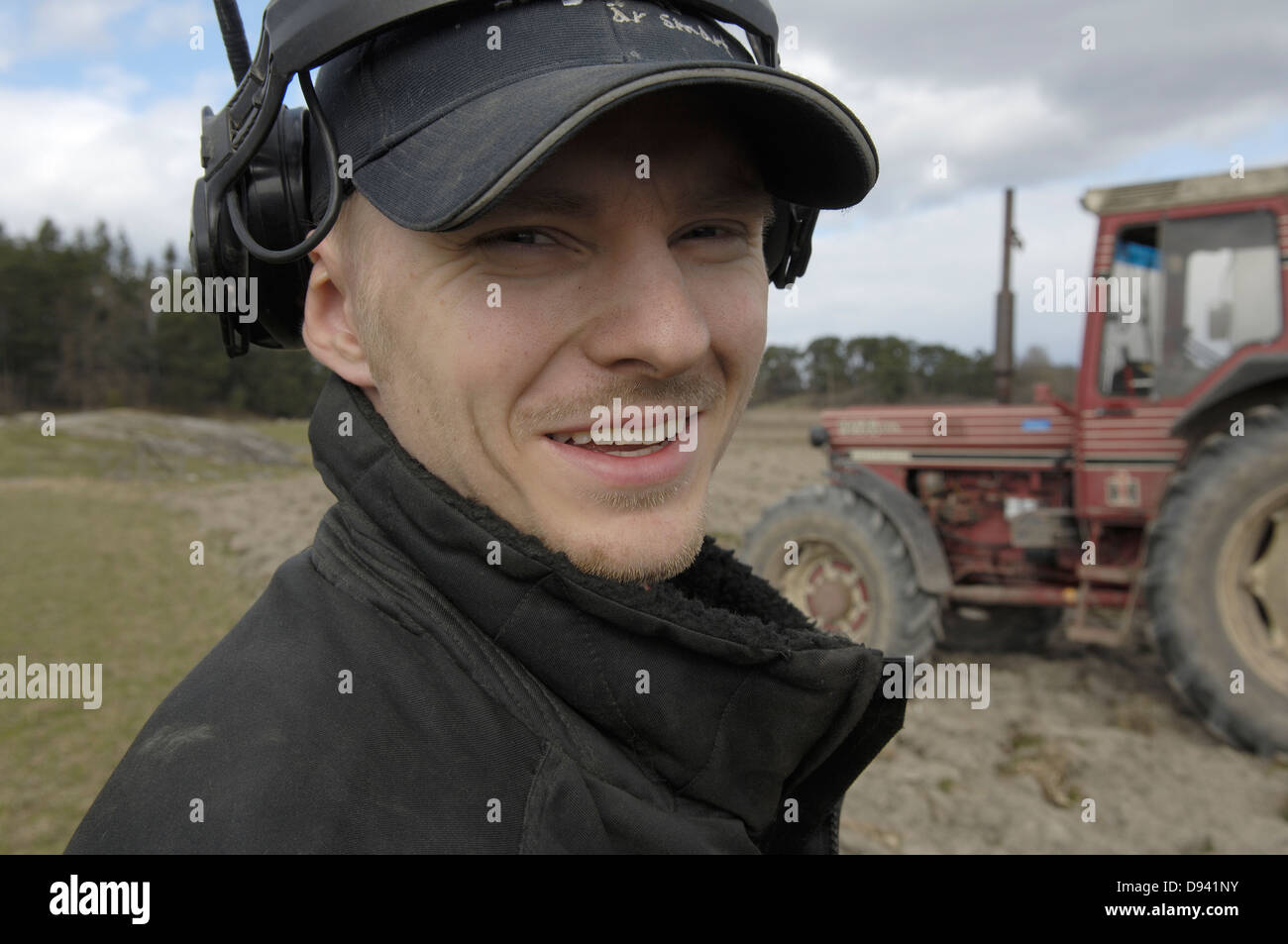 A farmer and a tractor, Sweden Stock Photo - Alamy