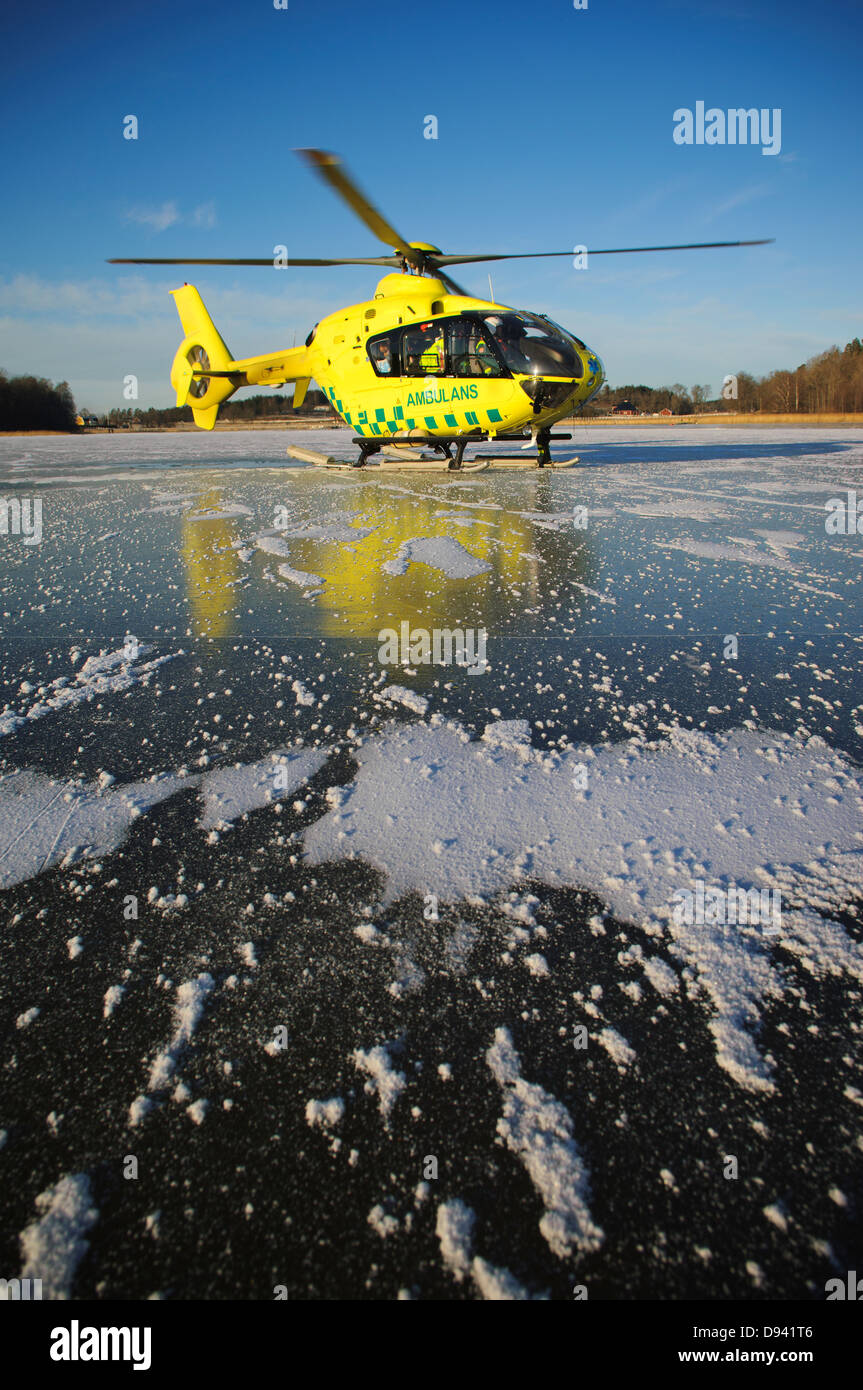 Medical rescue helicopter on frozen river Stock Photo - Alamy