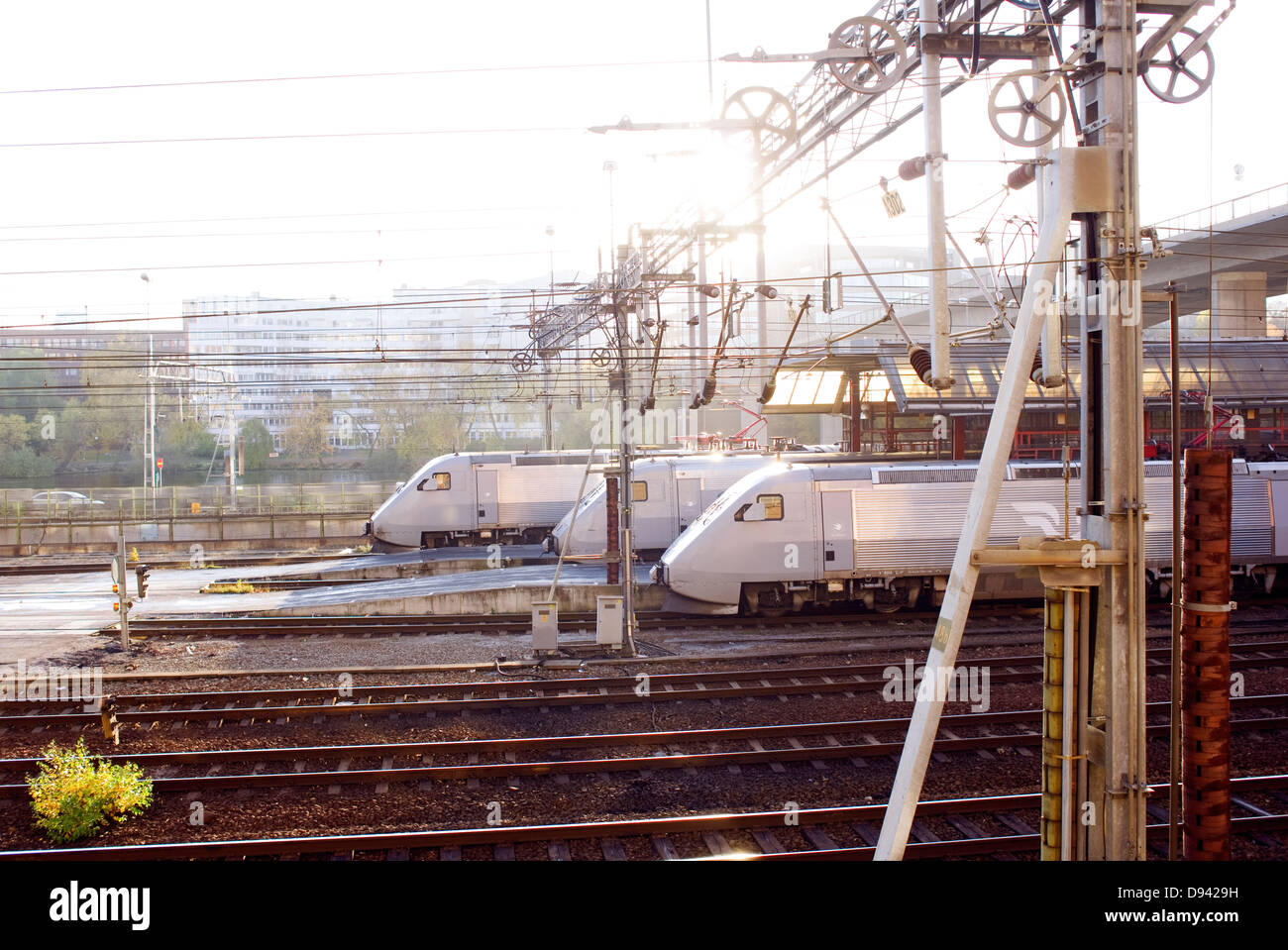 Modern trains on tracks, side view Stock Photo - Alamy