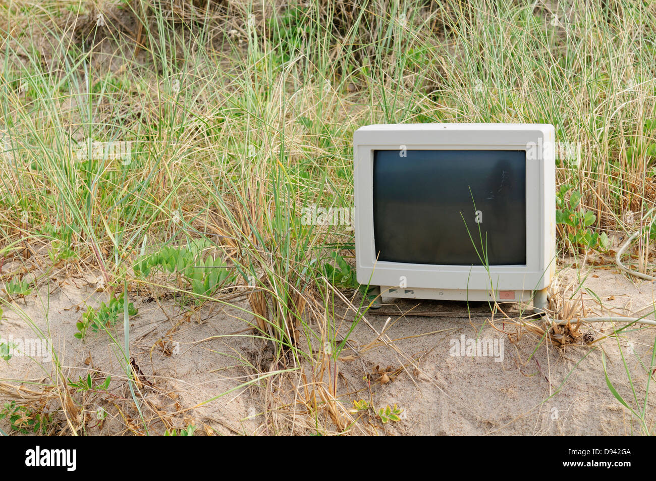 Abandoned computer screen on beach Stock Photo - Alamy