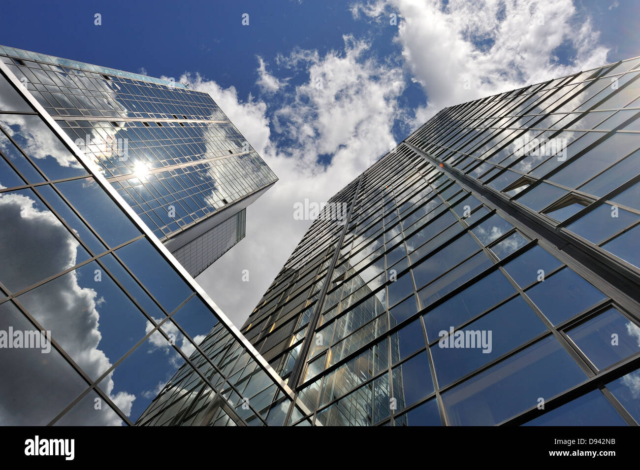 Glass exterior of hotel building against sky Stock Photo - Alamy