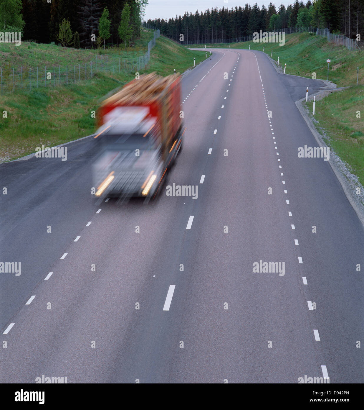 Vehicle moving on road, elevated view Stock Photo - Alamy