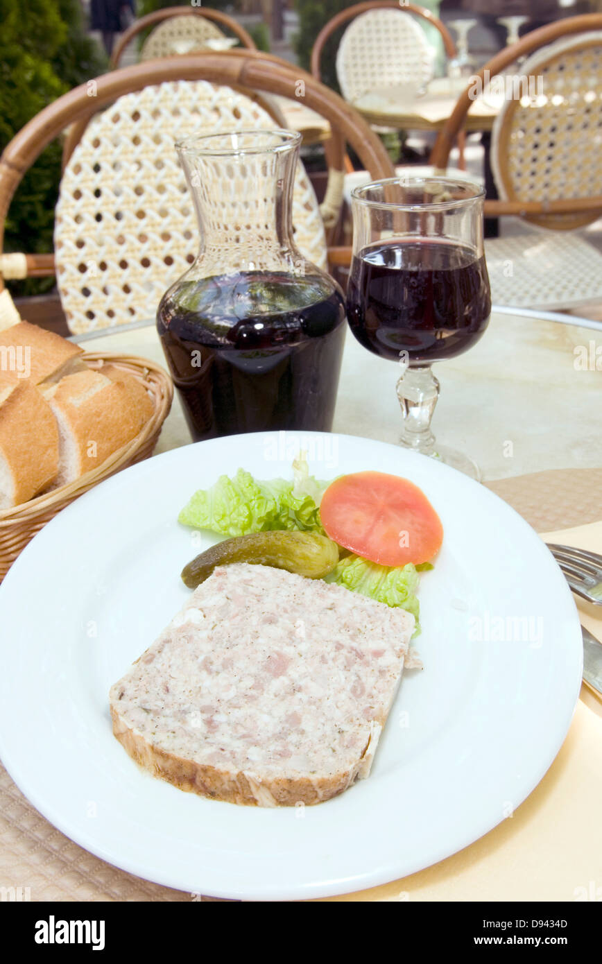 French food pate terrine of rabbit with red wine in cafe photographed ...