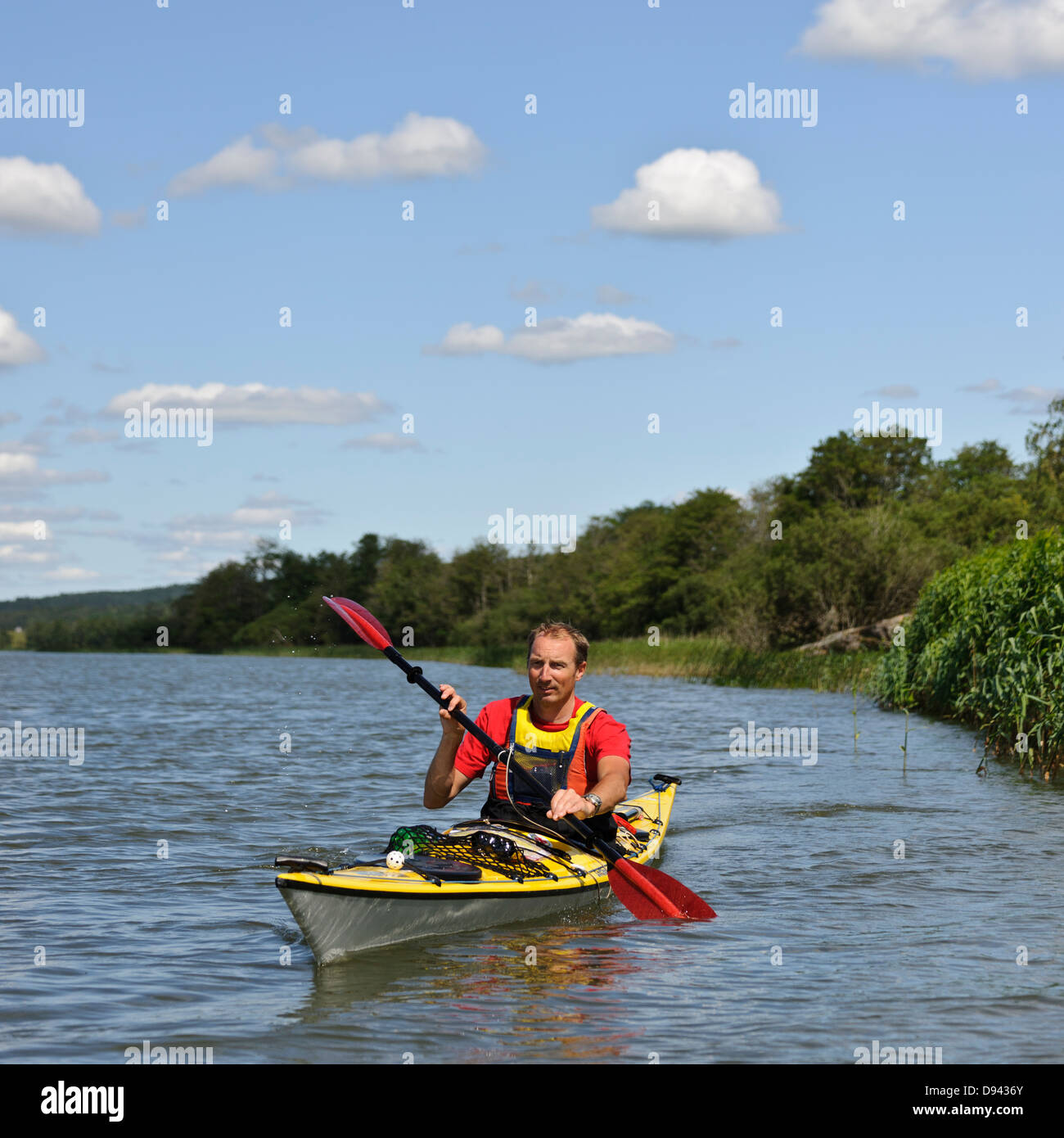 A man in a kayak Stock Photo - Alamy