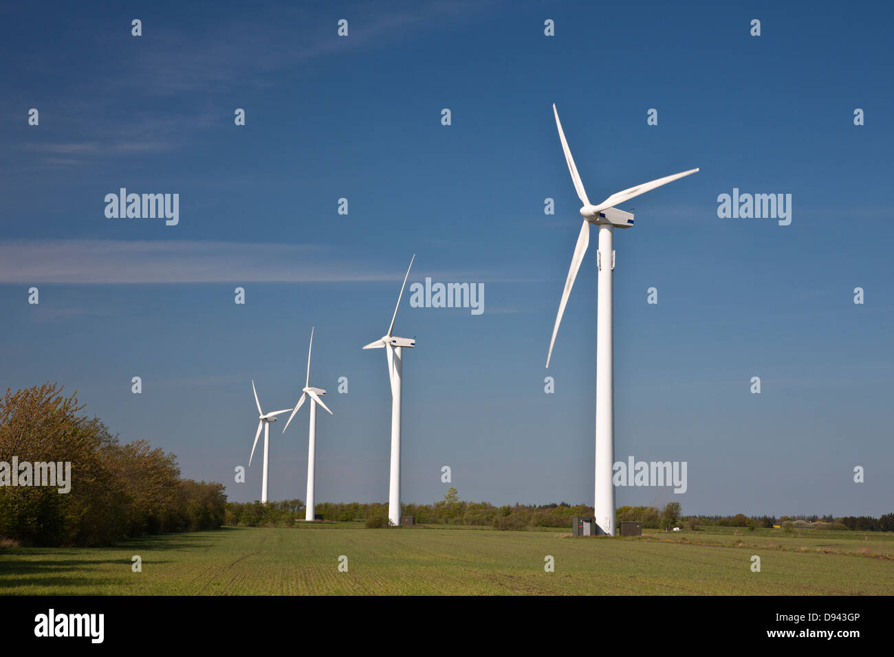 Wind turbines in field Stock Photo - Alamy