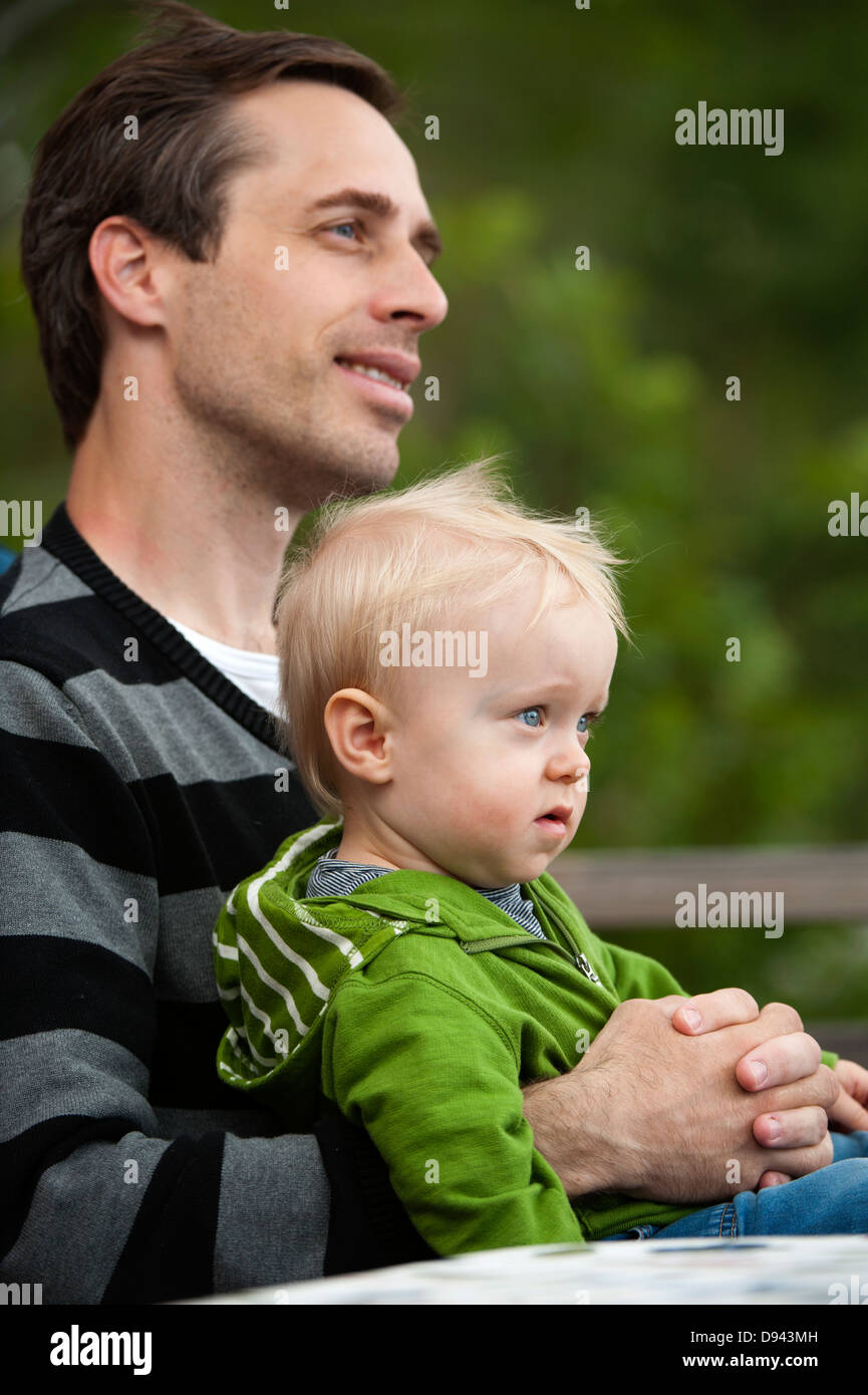 Portrait of man with son Stock Photo - Alamy