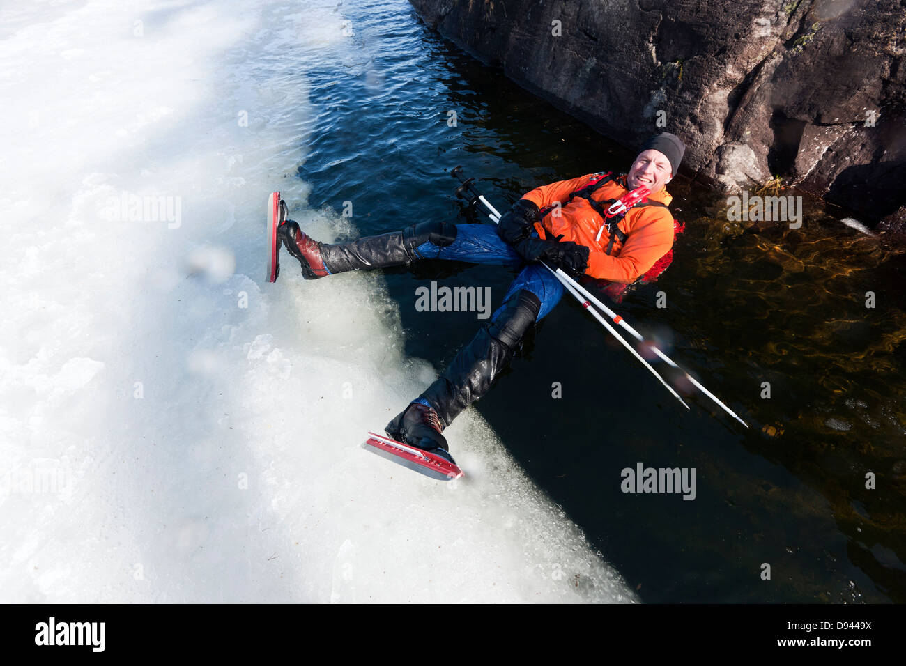 Man ice-skating and balancing over hole in the ice Stock Photo - Alamy