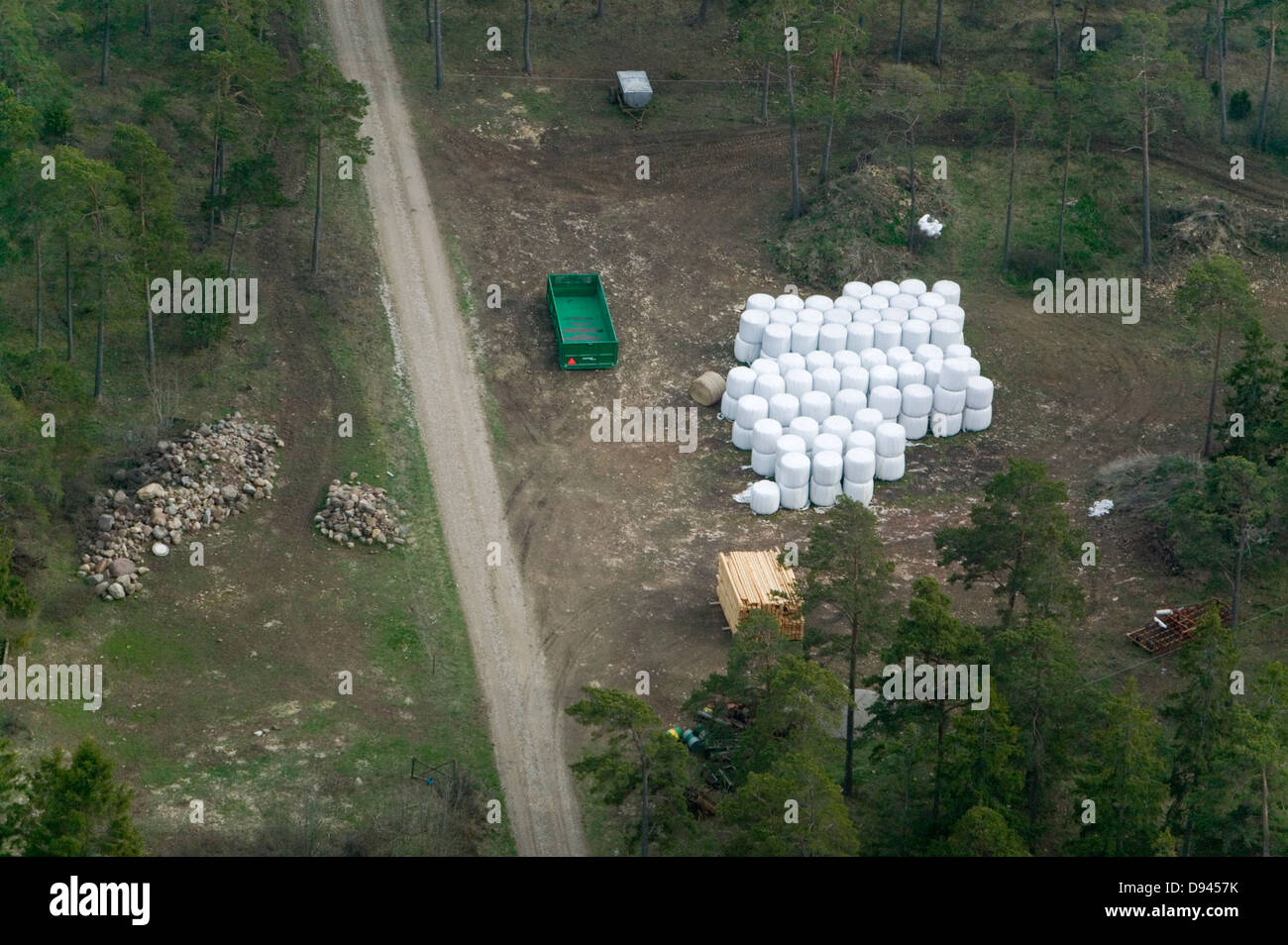 Ensilage and a forest road, Gotland, Sweden Stock Photo - Alamy