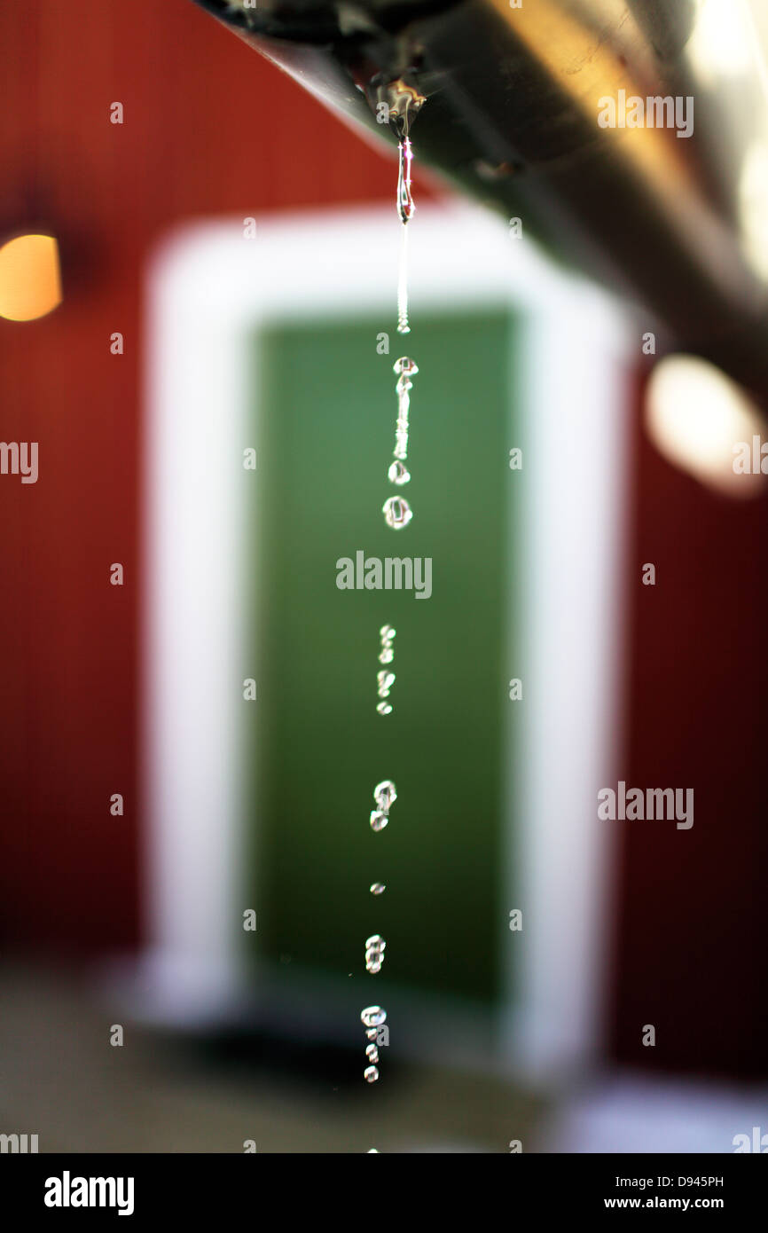 Water drops falling down Stock Photo - Alamy