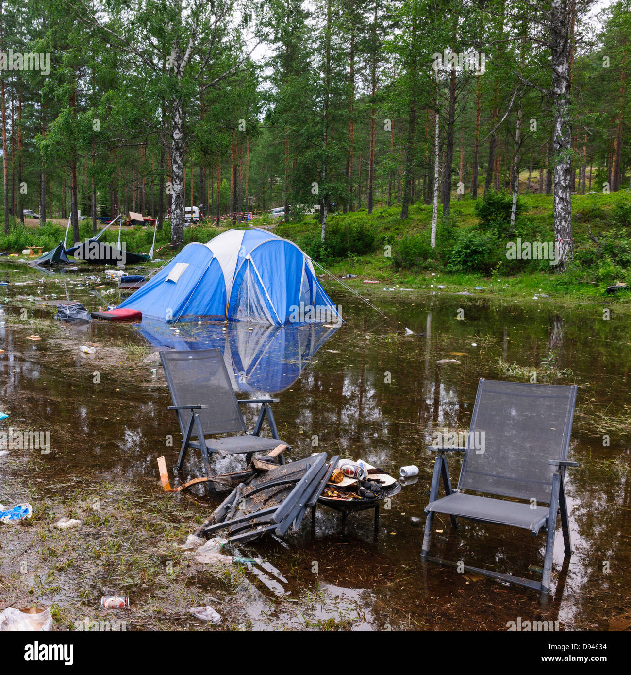 Rubbish around camping site Stock Photo - Alamy