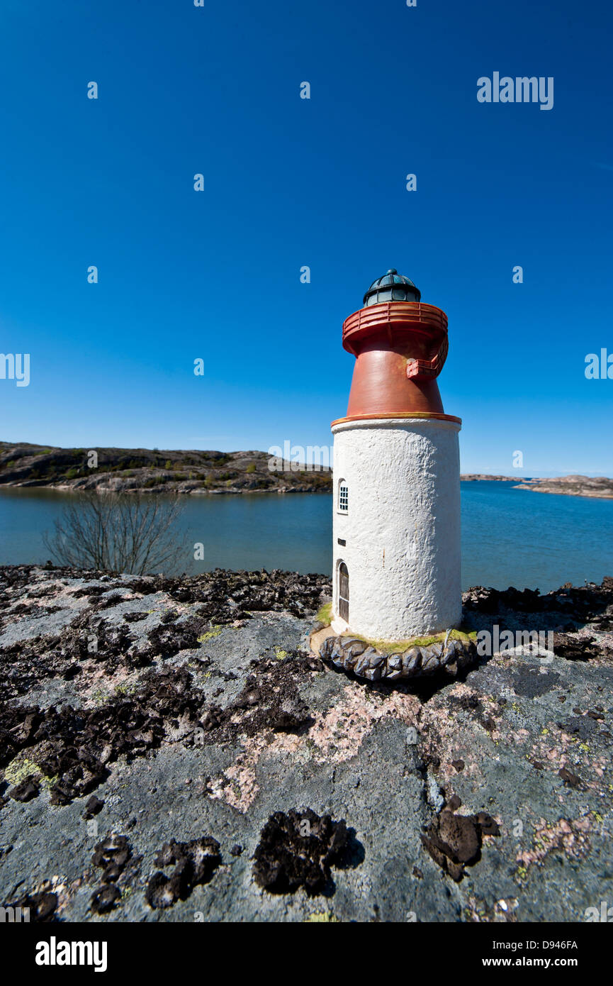 Lighthouse on cliff Stock Photo - Alamy