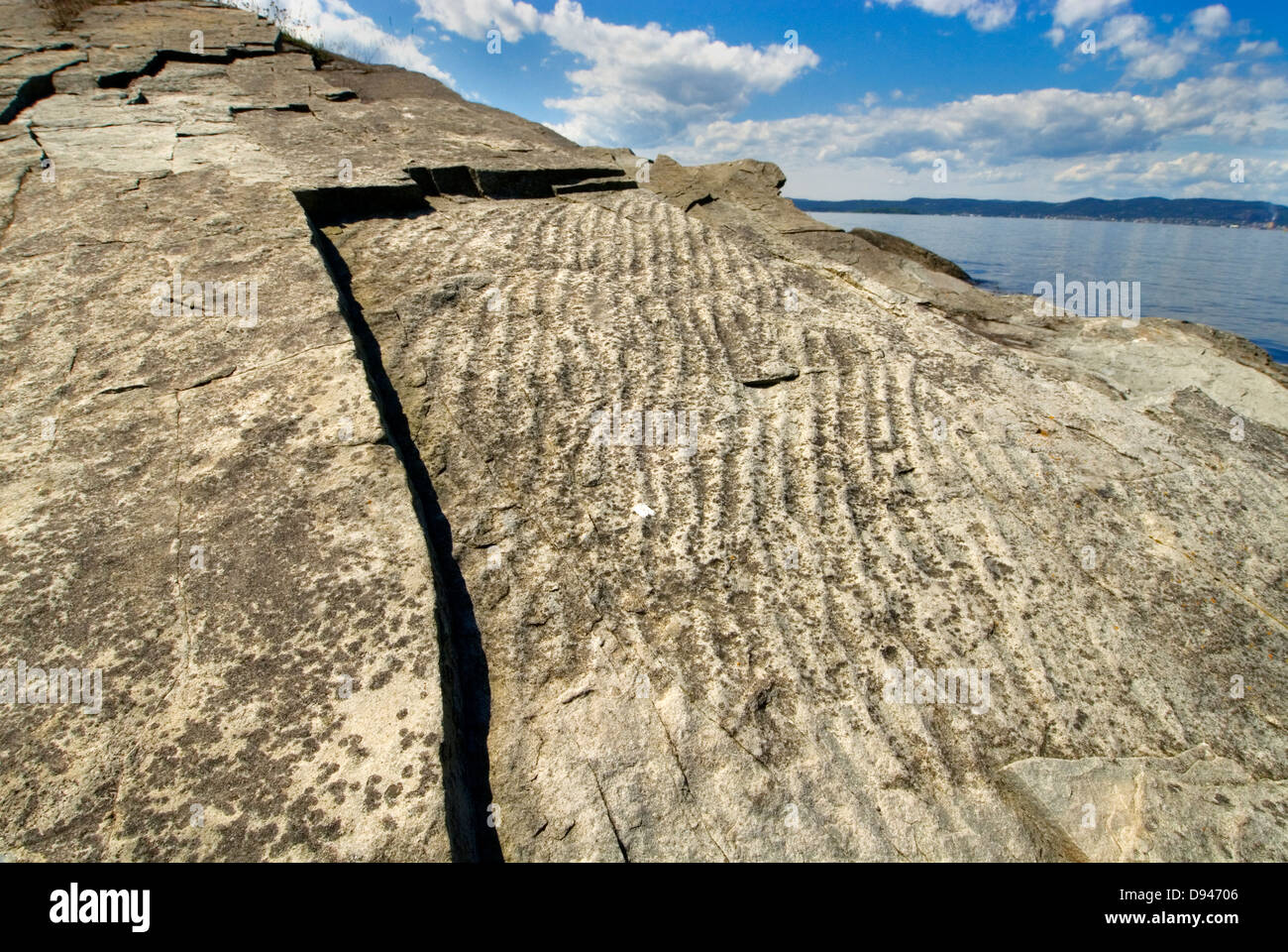 Shape of waves in a cliff, Norway Stock Photo - Alamy