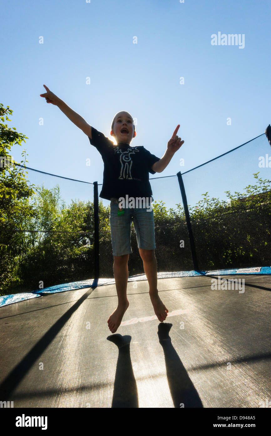 Boy barefoot jumping hi-res stock photography and images - Alamy