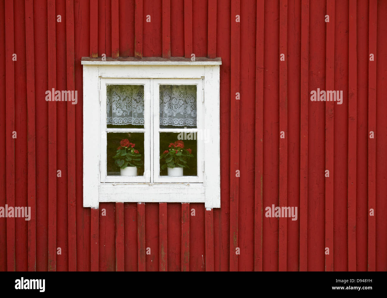 Window of red wooden house Stock Photo - Alamy